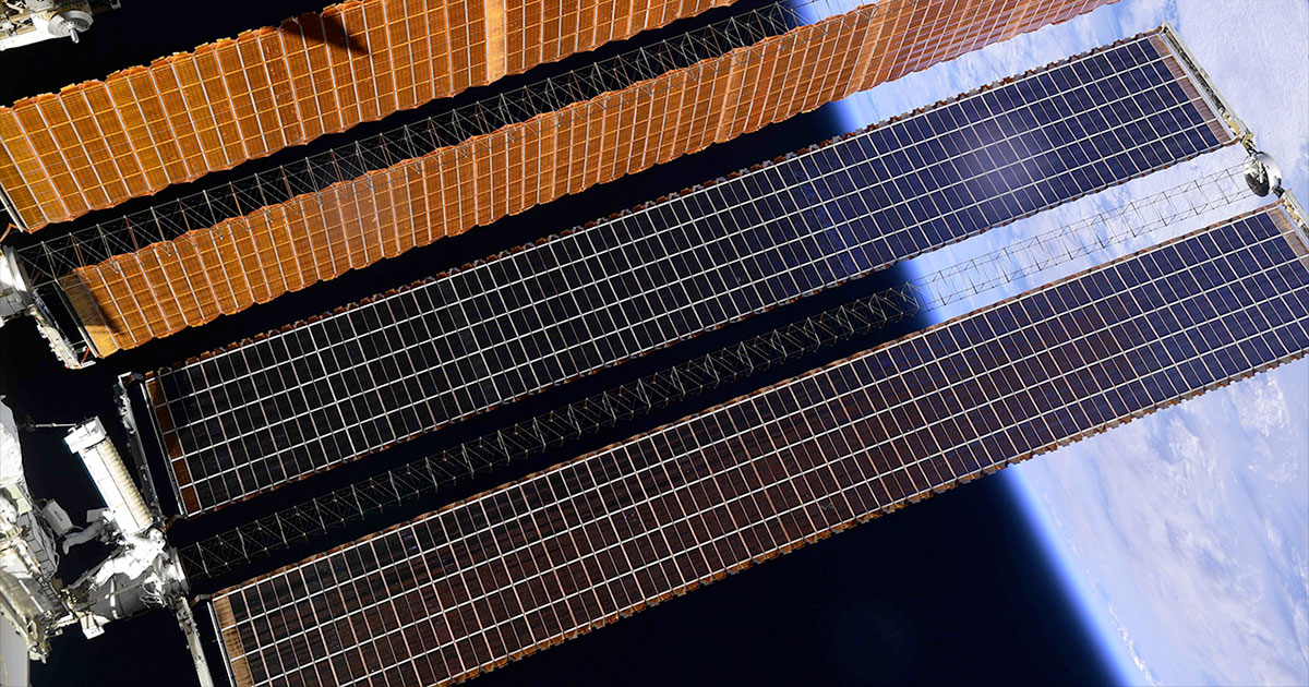 Spacewalking astronauts run out of time to roll out first of new solar ...