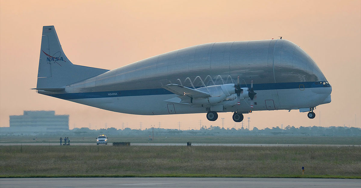 Space shuttle trainer lifts off for Seattle on NASA's Super Guppy ...