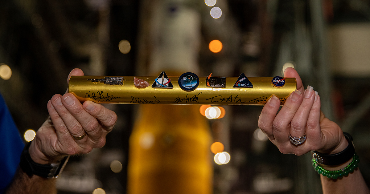 Symbolic baton rides with NASA Artemis I rocket on rollout for launch ...