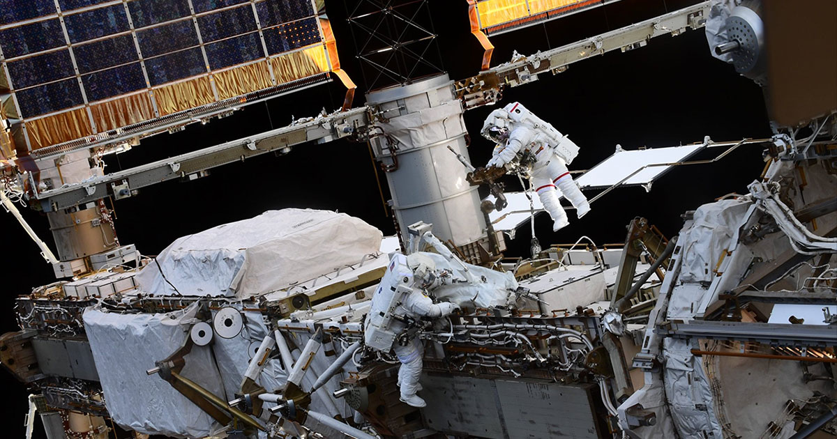 Astronauts prep station for new solar array on first all-international ...